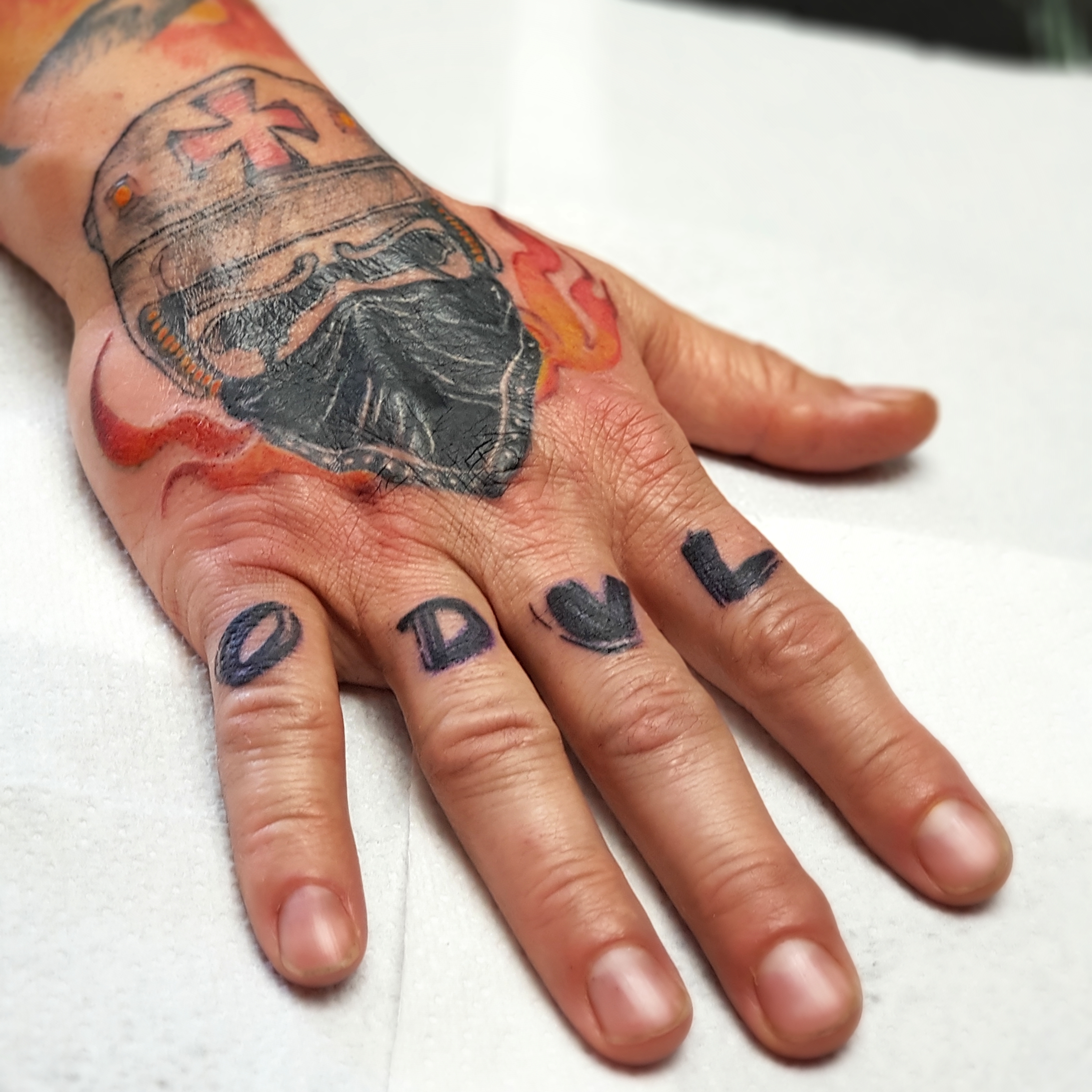 Hand and Finger Tattoos: Symbols & Ideas with Black Hat Tattoo